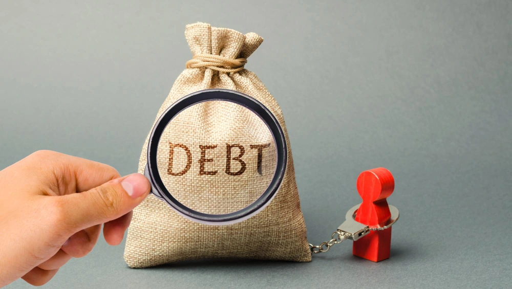 What Is a Debt Trap? Causes and Tips to Avoid It
